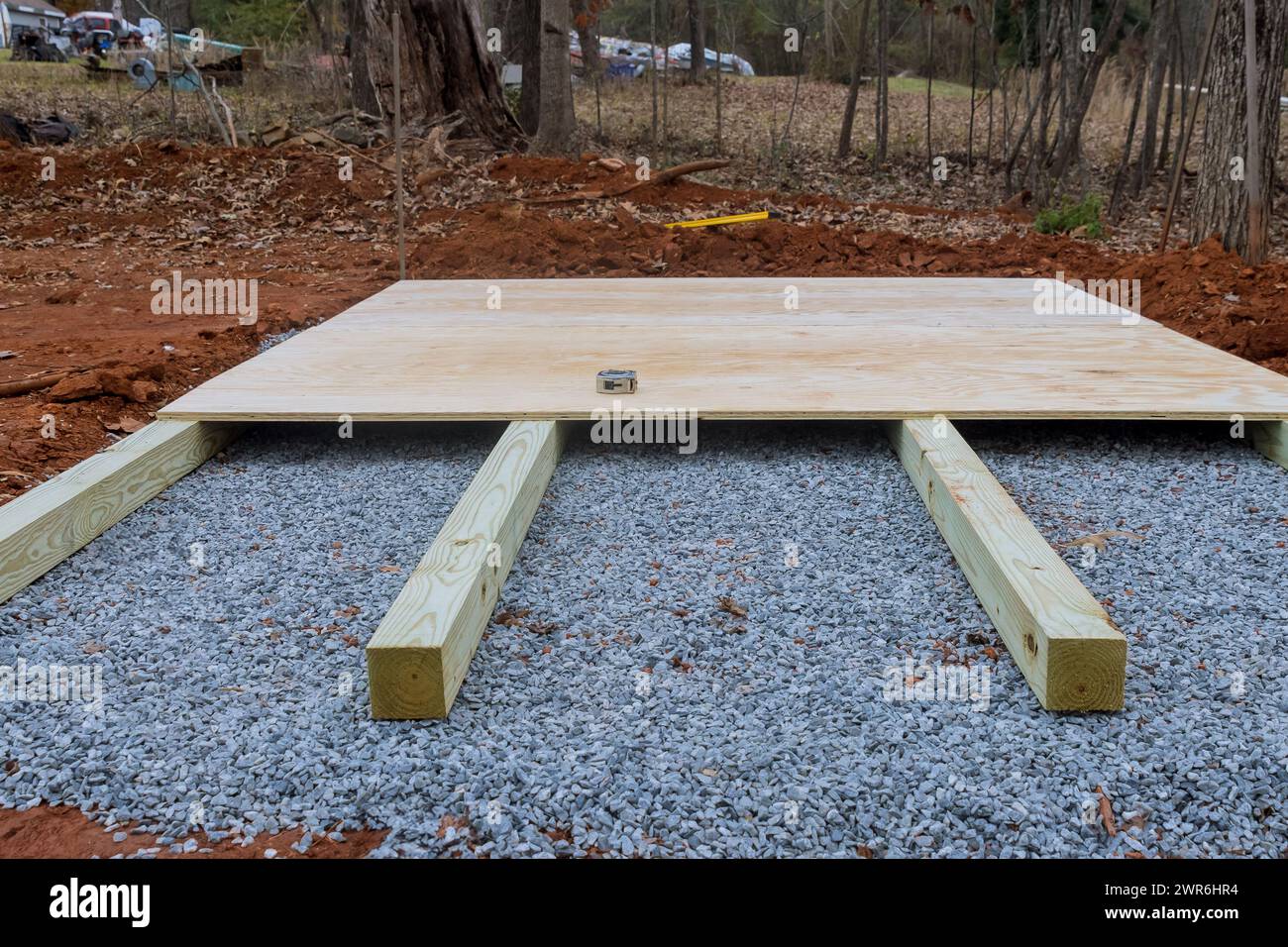 Wooden platform preparation for storage shed installation Stock Photo ...
