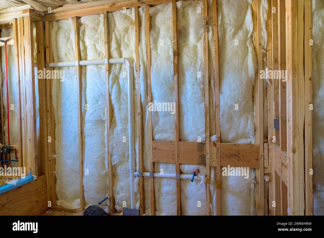 An insulation wall is being constructed for new residential building ...