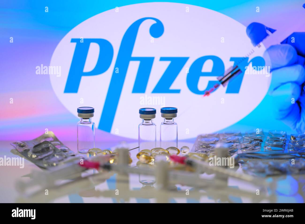 Brussels, Belgium. 11th Mar, 2024. Medical vial syringe and pills with ...