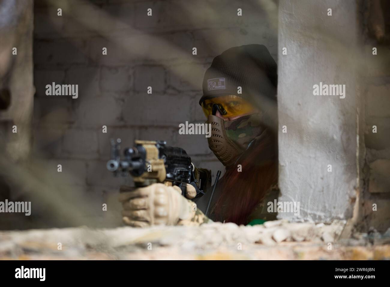 Ukrainian female soldier armed with AK rifle training on the shooting ...