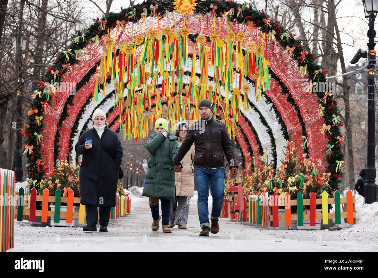 Russian Maslenitsa, people walking on background of shrovetide ...