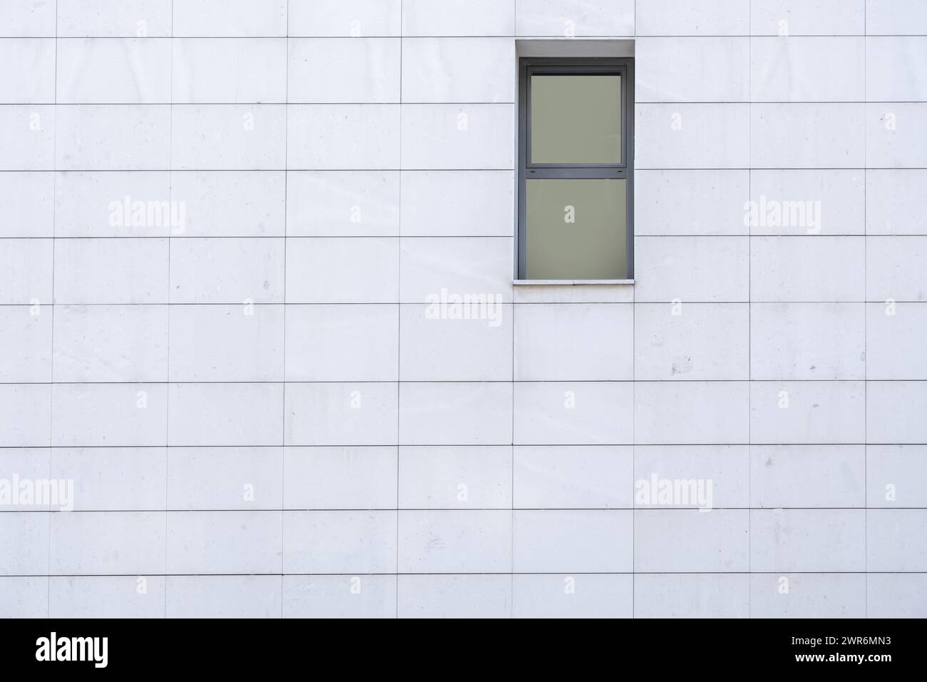 Small gray aluminum rectangular window on a white tiled wall Stock ...