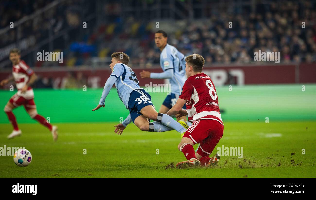 Duesseldorf Germany. 08th Mar 2024. Anssi Suhonen (HSV) Isak Bergmann ...