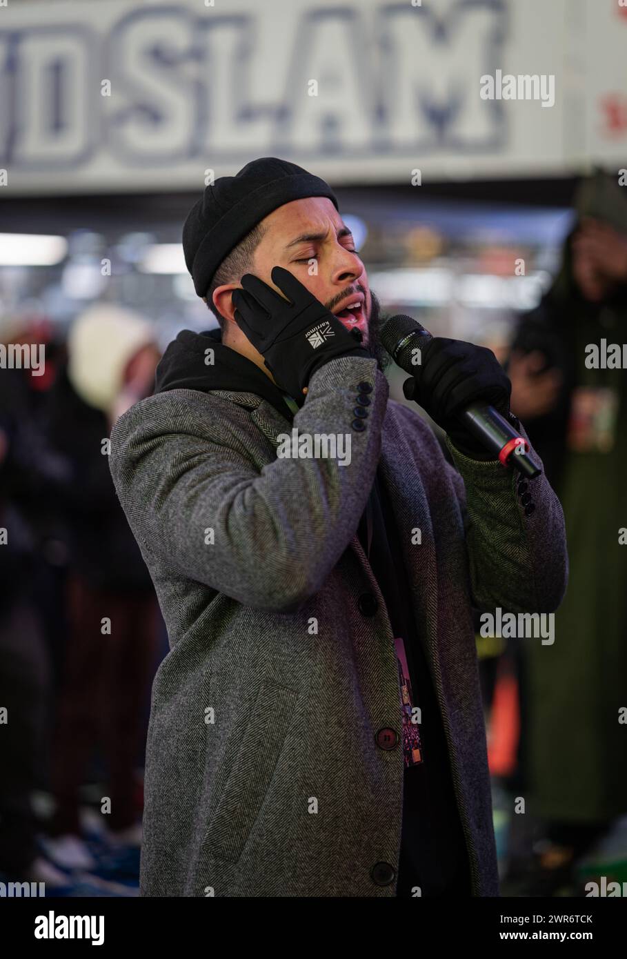 New York City, USA. 10th Mar, 2024. Faisal Latif lead prayer as muslims ...