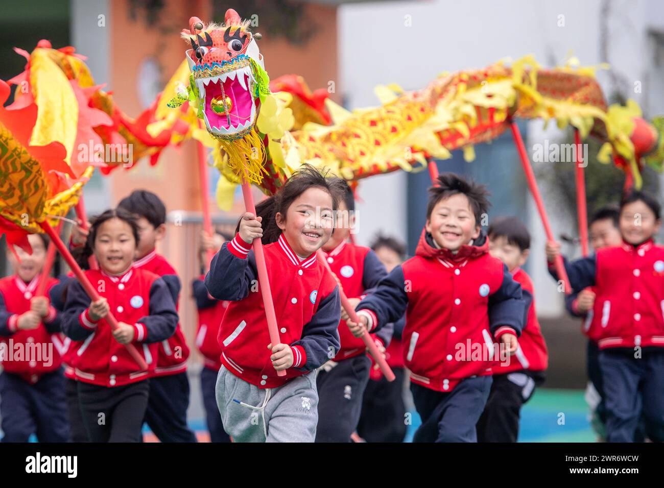 Beijing, China's Zhejiang Province. 11th Mar, 2024. Children perform ...