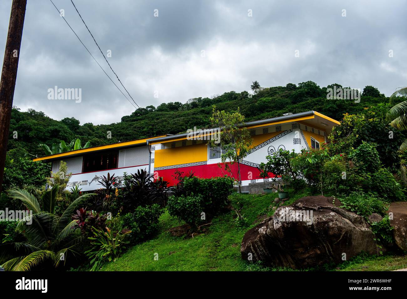 House in Taioha'e, Nuku Hiva painted with Marquesan flag Stock Photo ...