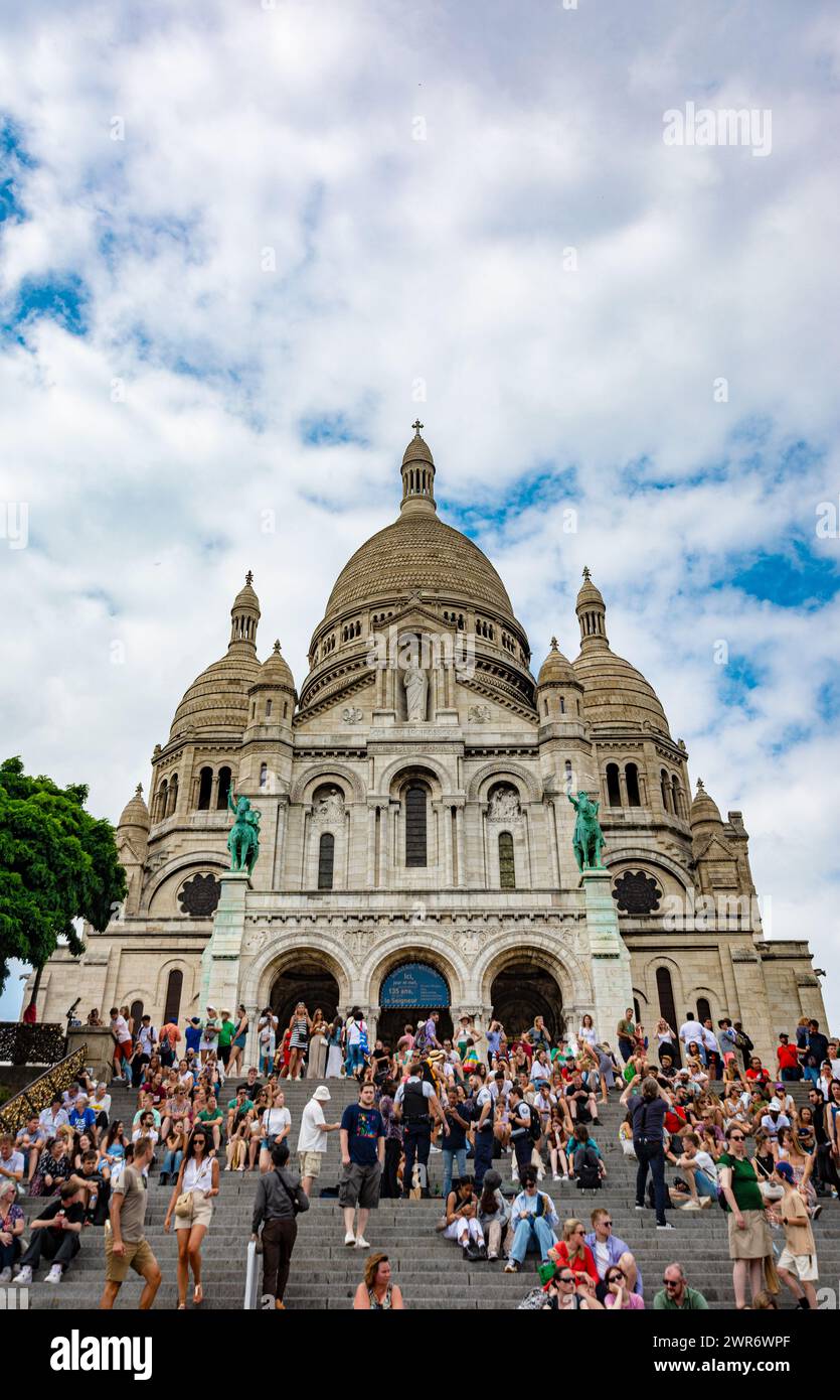 Paris, France - July 23 2022: Sacre Coeur at the top of Montmarte Hill ...