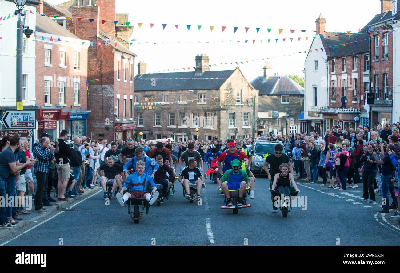 27/05/18 Competitors take part in a vomit-inducing wheelbarrow-race ...