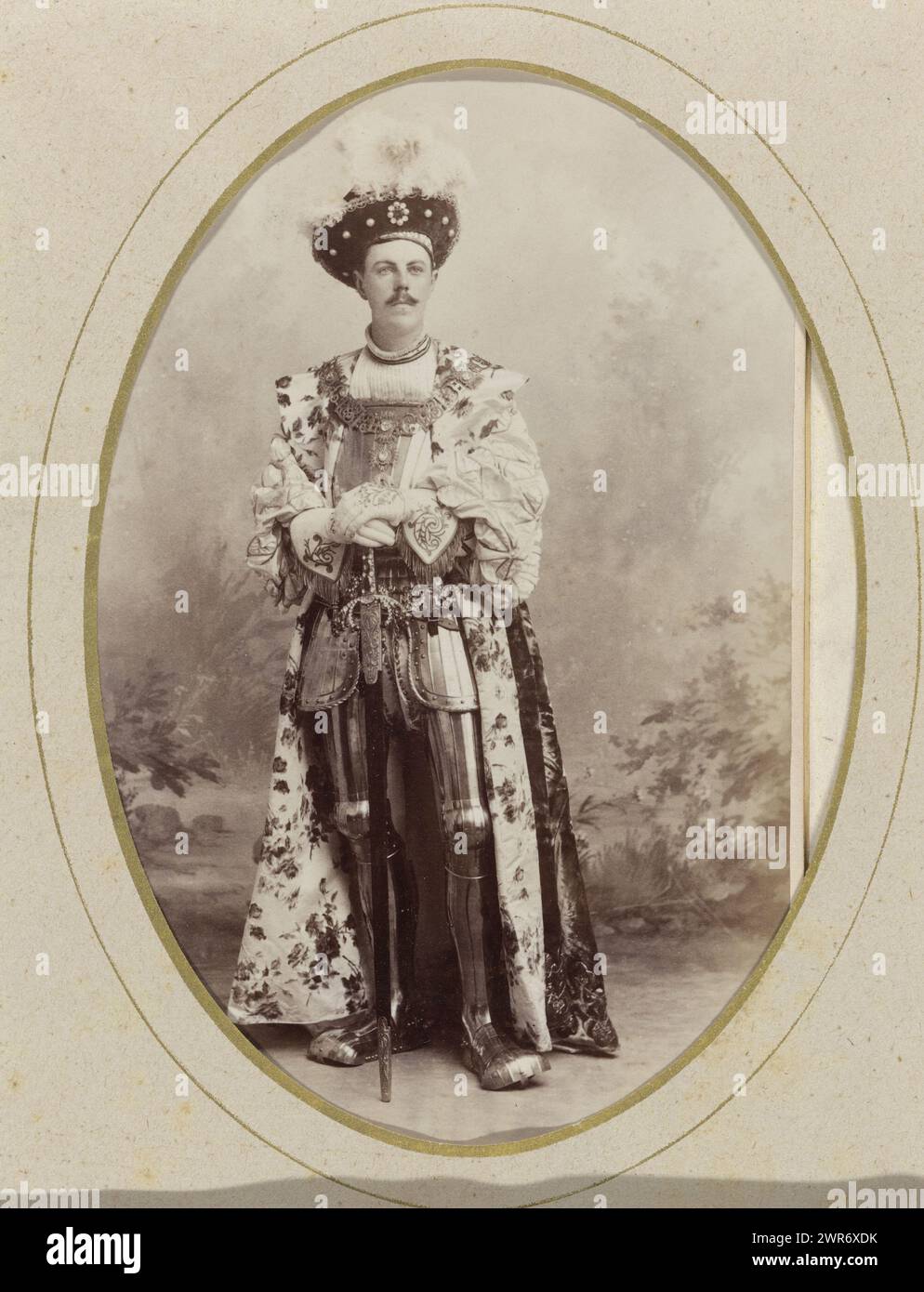 Portrait of a young man in costume with sword, This photo is part of an ...