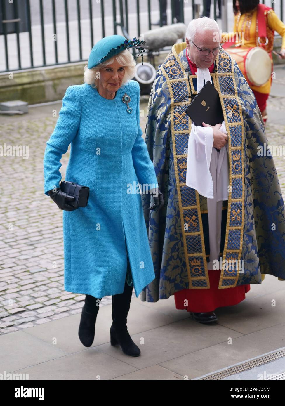 Queen Camilla is escorted by the Dean of Westminster The Very Reverend ...