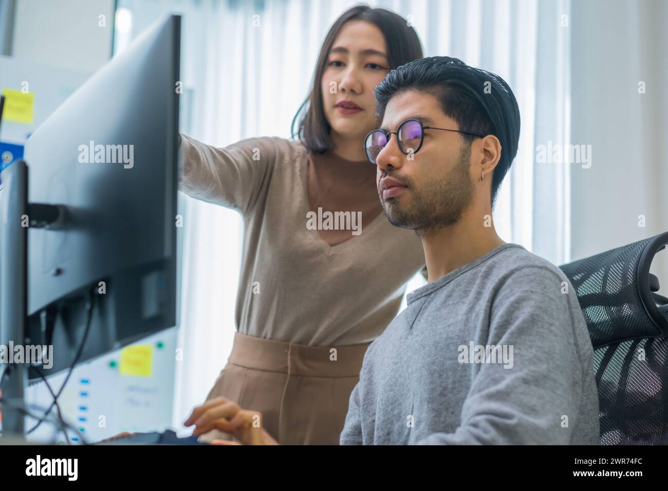 Asian And Indian Developer Team Discussion Feedback Analysis Coding Data With Software Computer