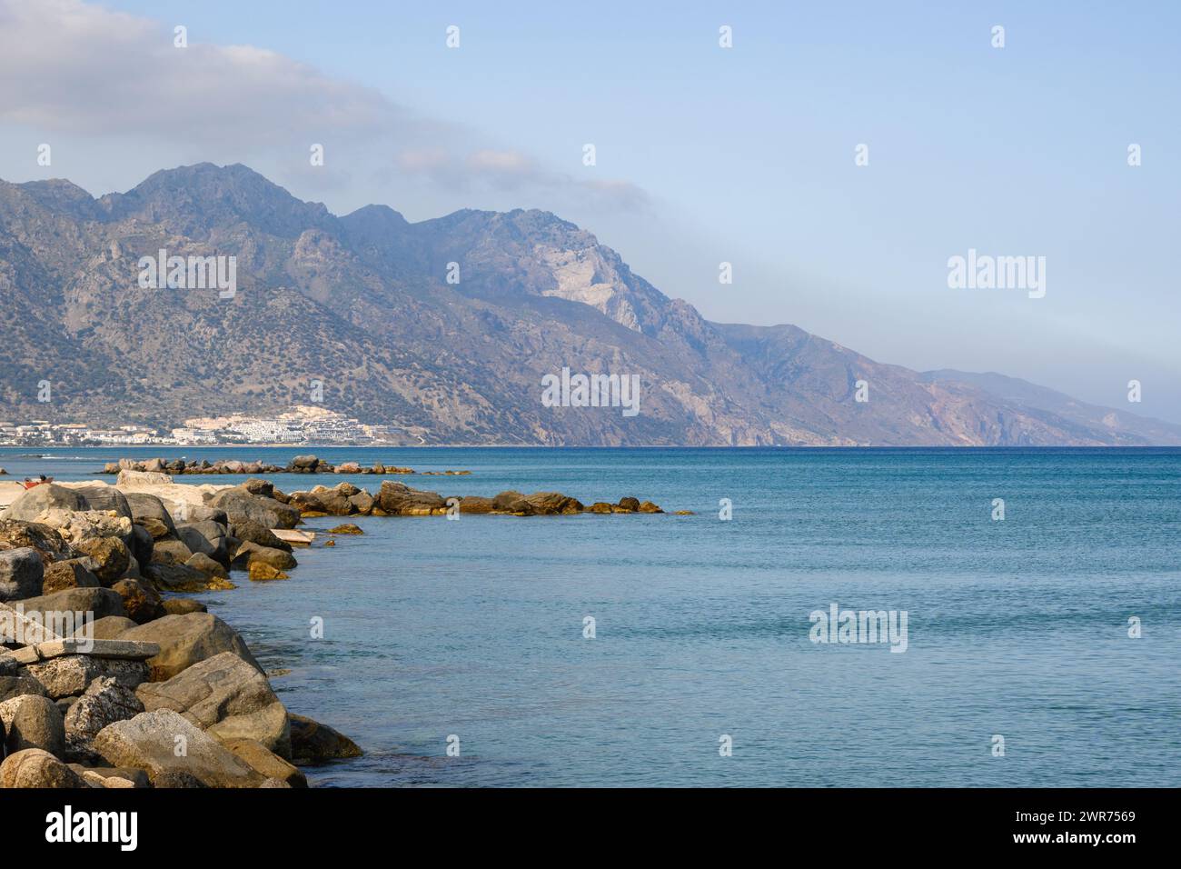 Rocky coast on the beach in Kardamena resort. Kos island, Greece Stock ...