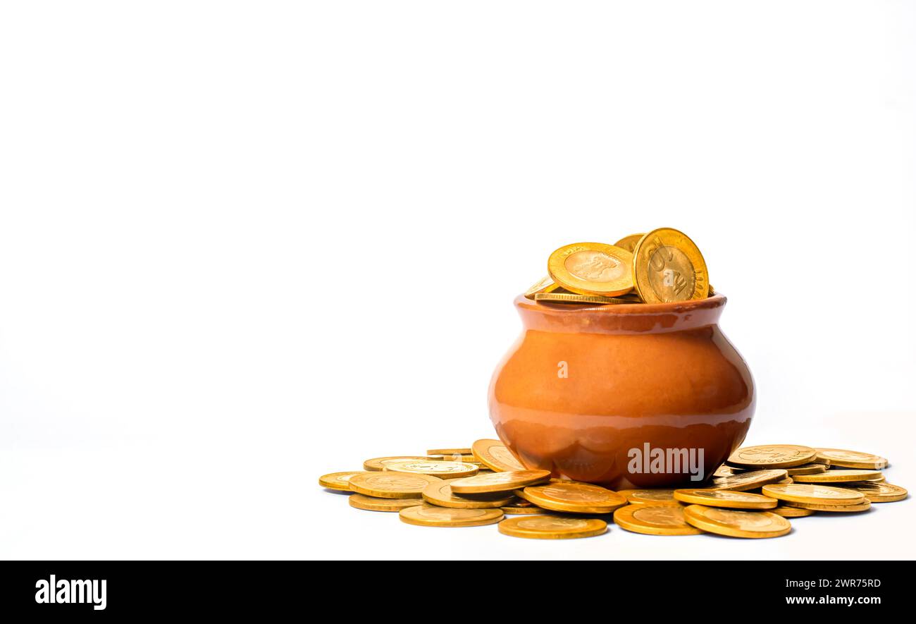 Gold coins in a clay pot on white background with copy space Stock ...