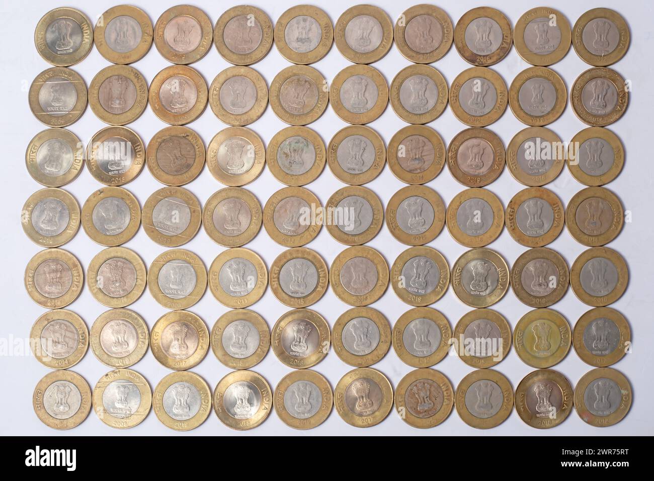 Top view of various Indian ten rupee coins obverse coin texture ...
