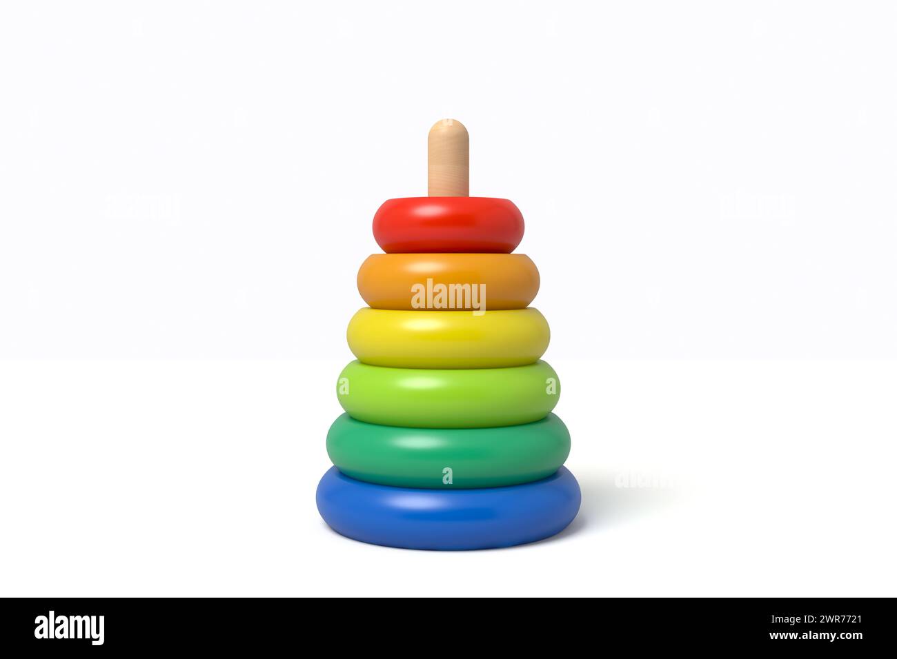 Colorful wooden stacking rings toy isolated Stock Photo - Alamy