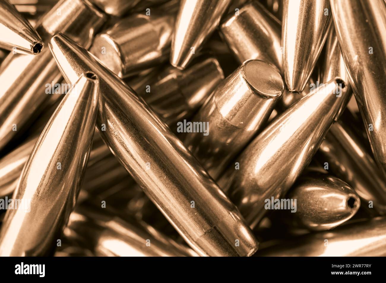 Full-frame background photo of golden metal bullets closeup Stock Photo ...