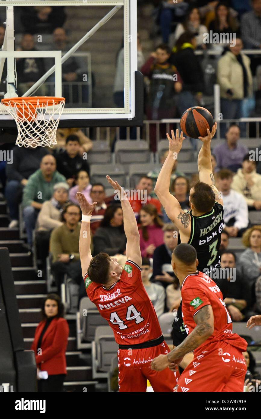 Granada, Spain. 09th Mar, 2024. Keith Hornsby of Bilbao Basket (R) and ...