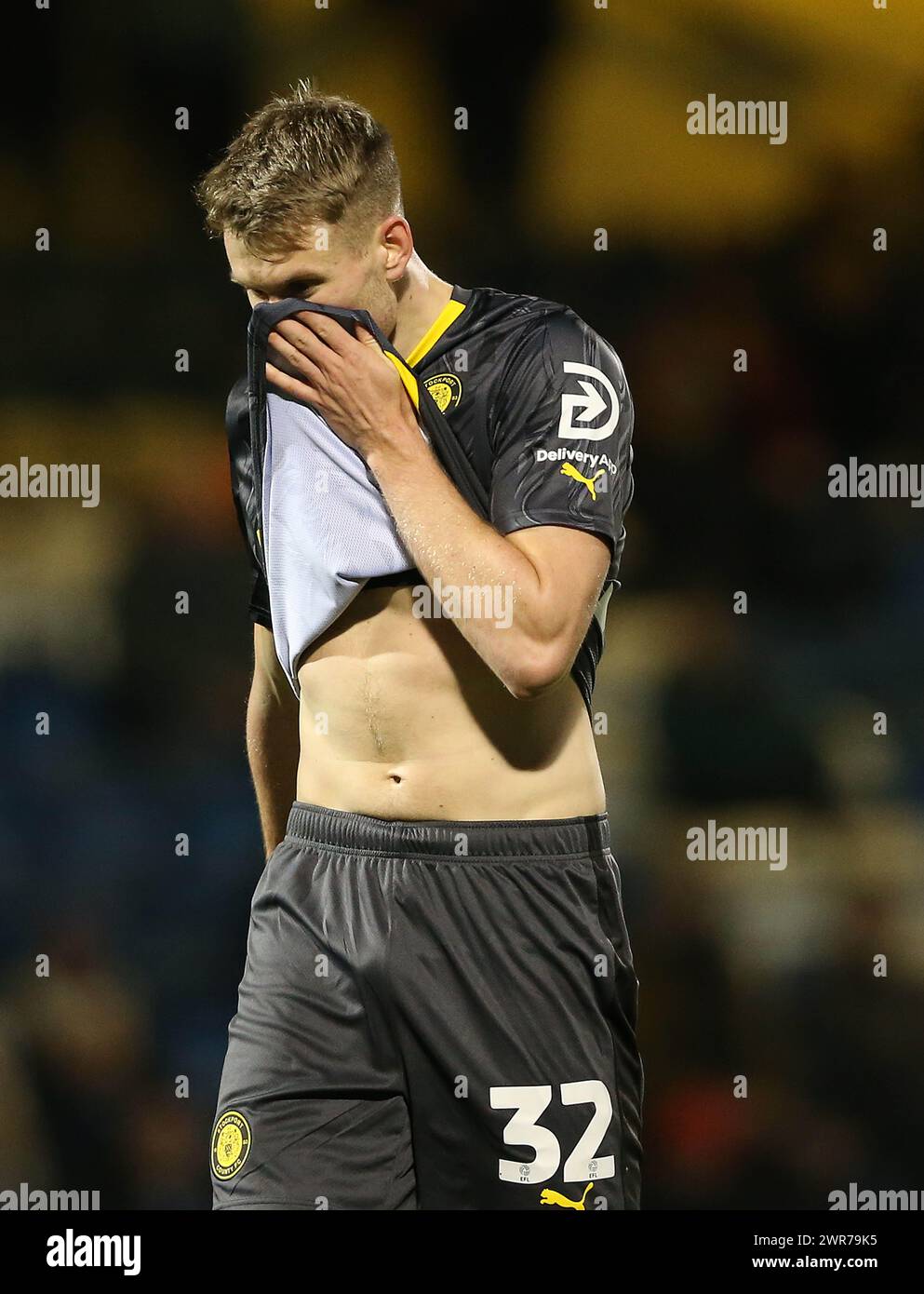 Lewis Cass of Stockport County looks disappointed & dejected ...