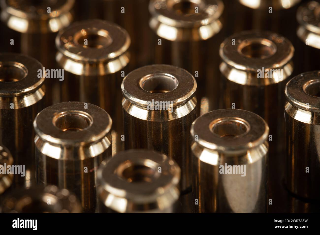 Golden bullet bottoms shell set pattern closeup seamless background ...