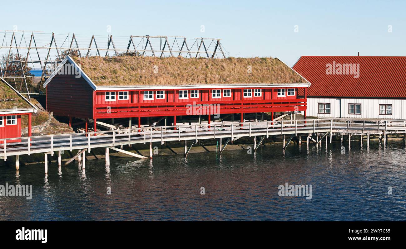 Coastal Norwegian red wooden barns on a rocky island. Ringholmen ...