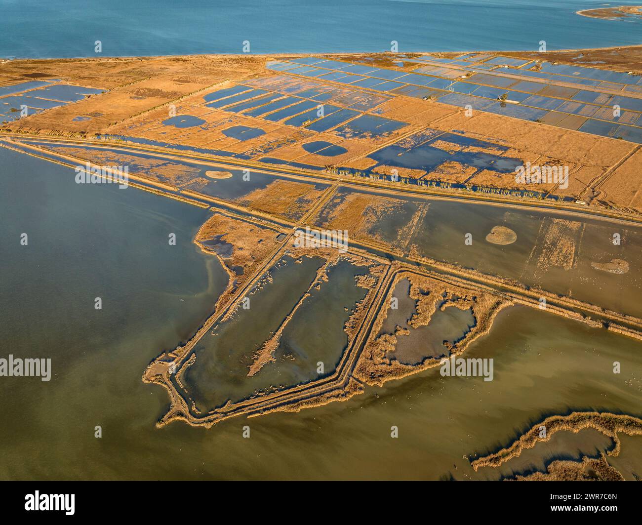 Aerial view of the Canal Vell wetland and the rice fields and canals of ...