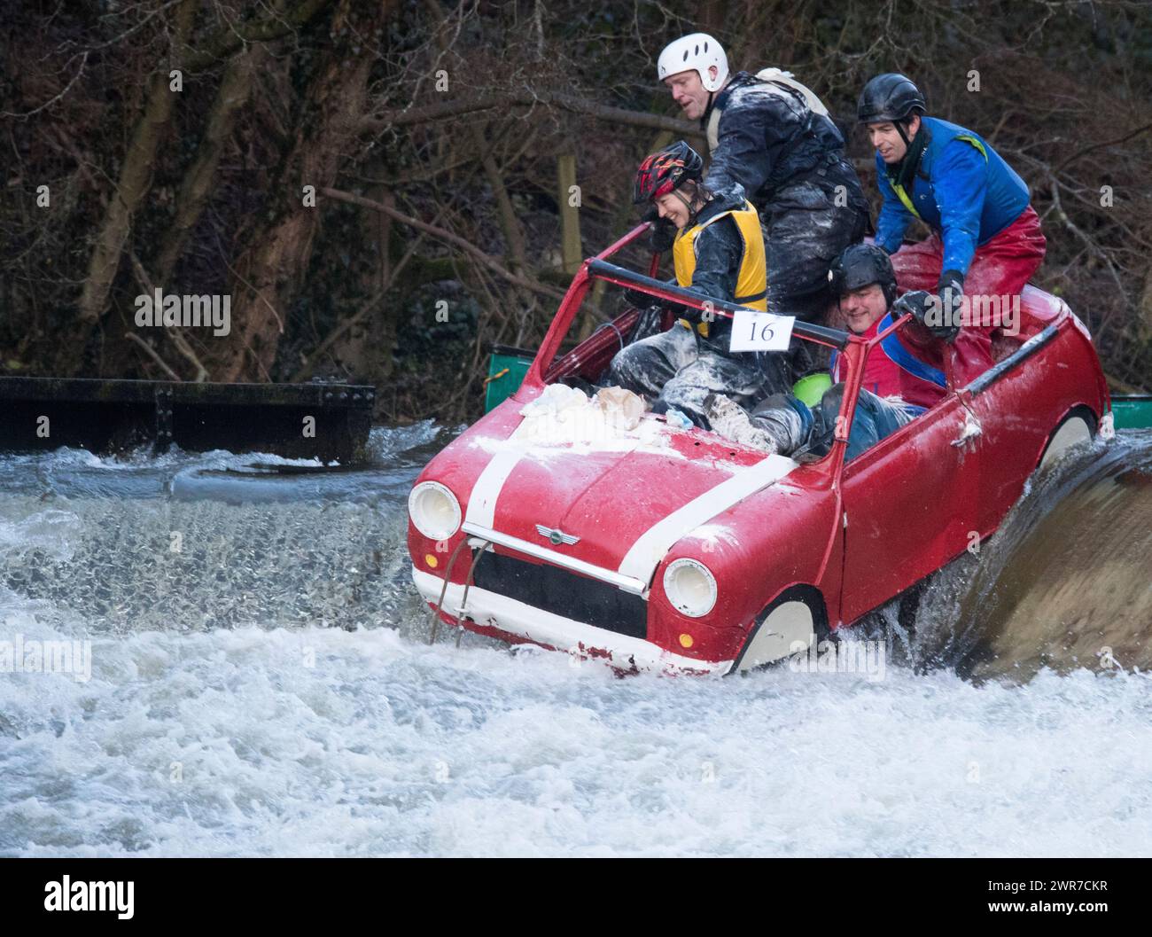26/12/17 Competitors brave freezing conditions as they plunge over a ...
