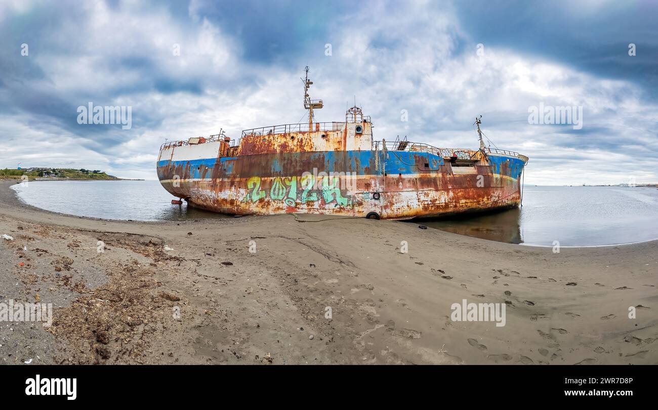 Abandoned Rusty Shipwreck on a Desolate Beach Landscape Stock Photo - Alamy