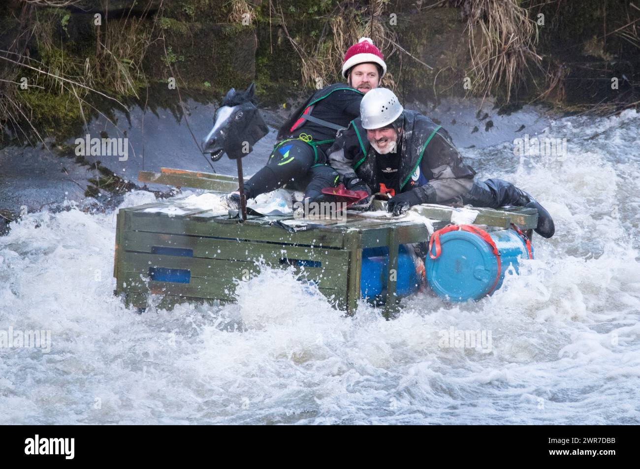 26/12/17 Competitors brave freezing conditions as they plunge over a ...
