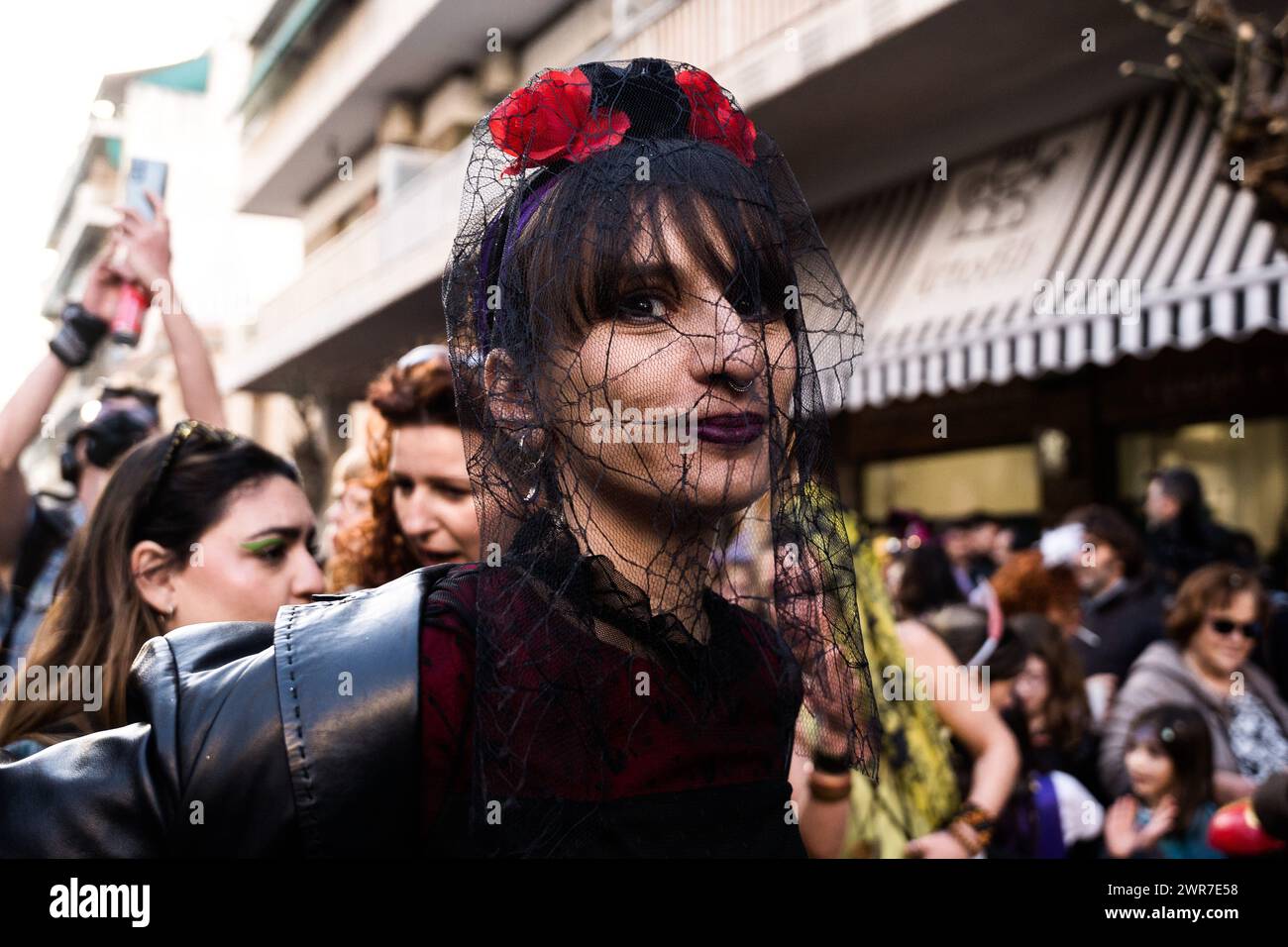 Athens, Greece. 10th Mar, 2024. A girl is participating in the colorful ...