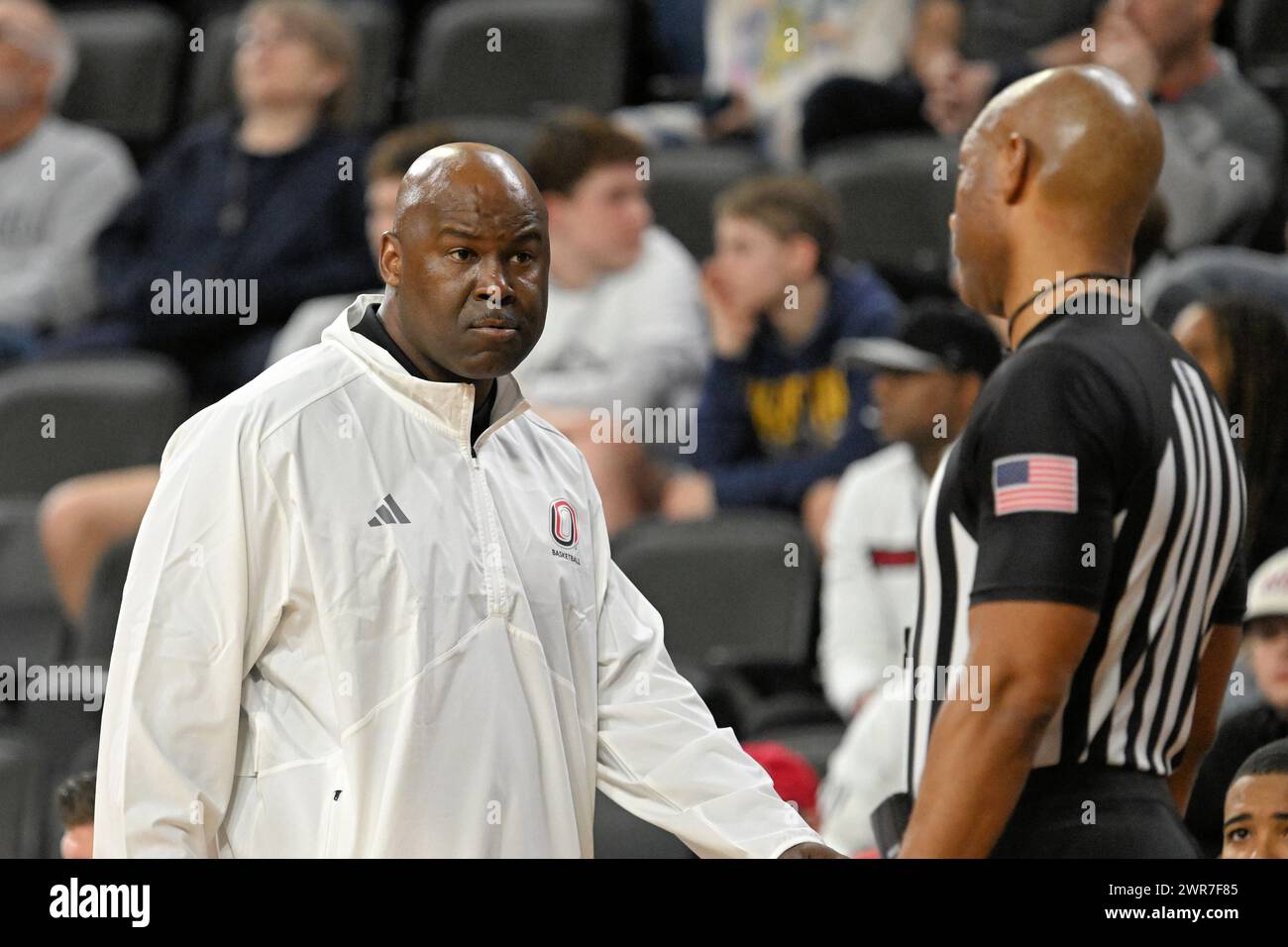 Nebraska-Omaha Mavericks head coach Chris Crutchfield has words with an ...