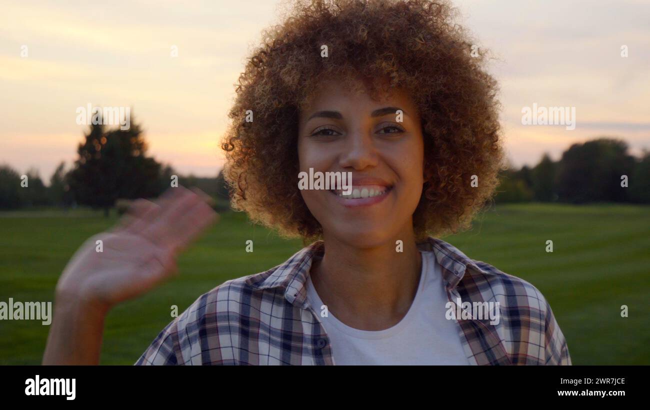 Cute smiling multiracial young African woman Generation Z with afro ...