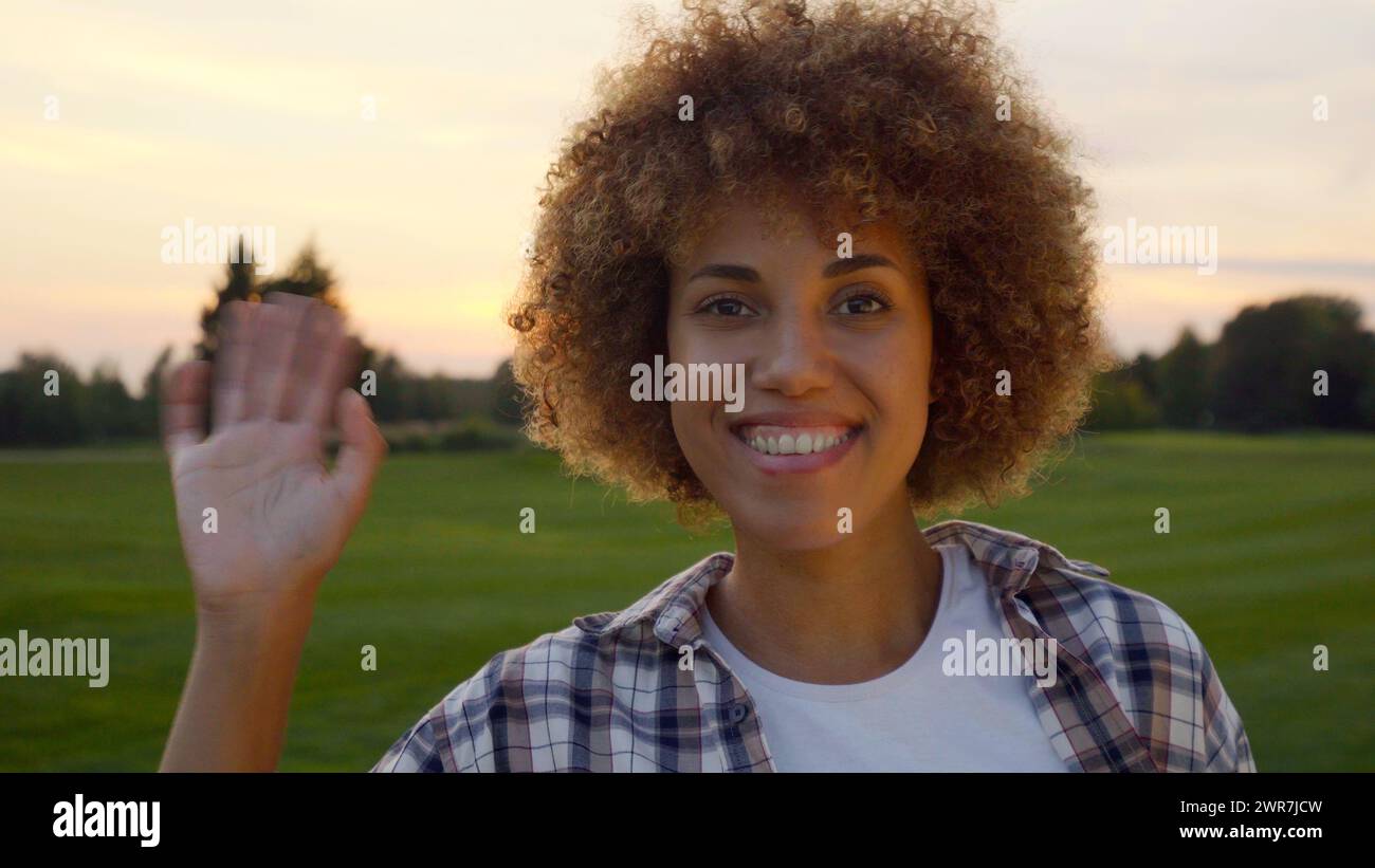 Cute smiling multiracial young African woman Generation Z with afro ...