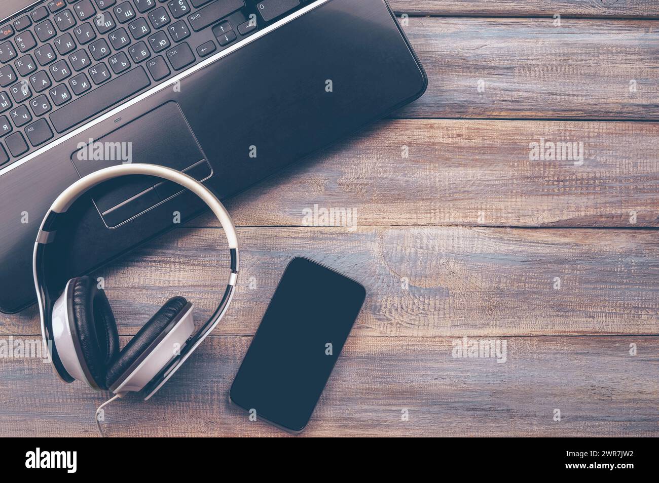 Flat lay photo of office desk with laptop, smartphone, with copy space ...