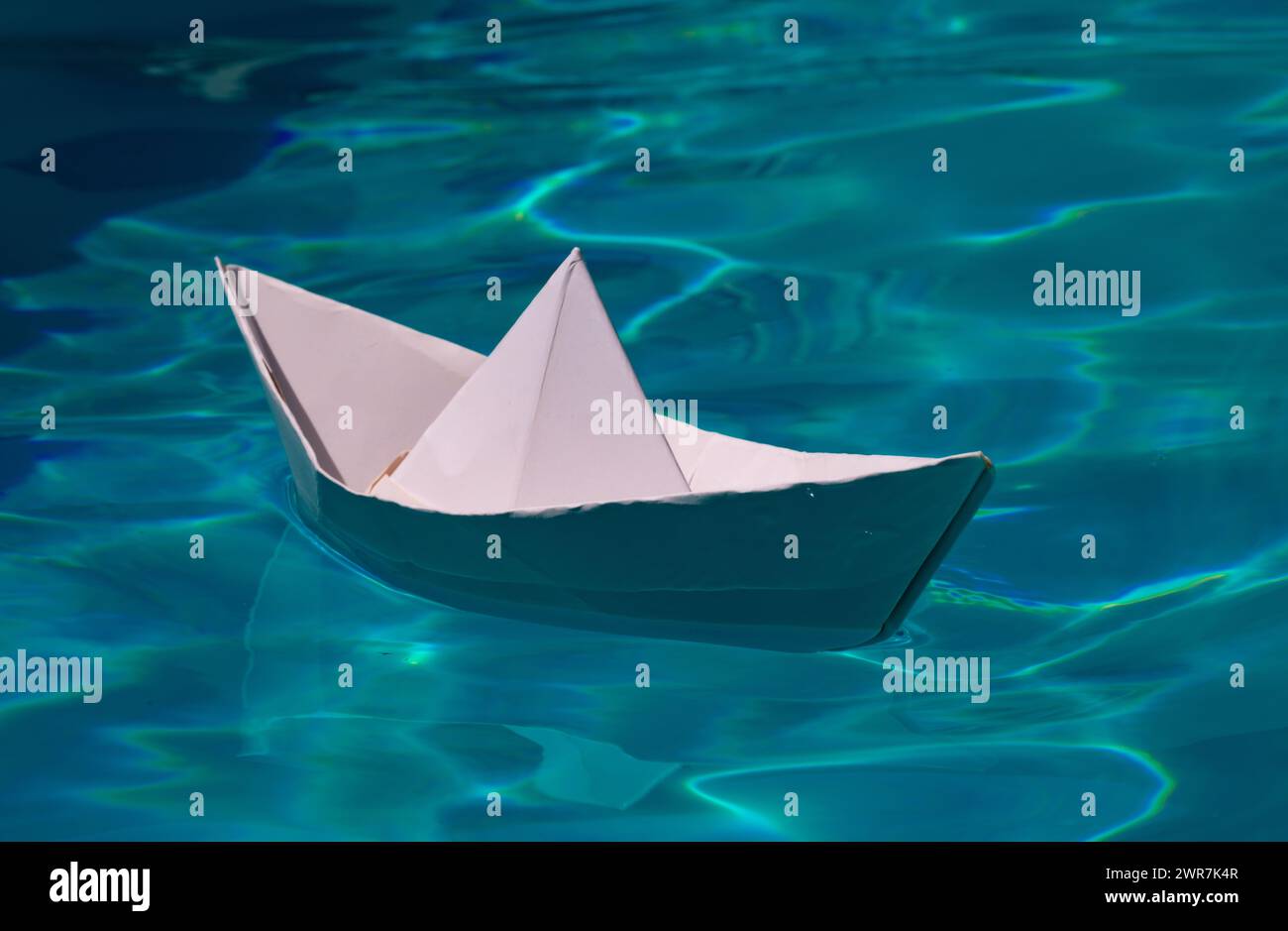 Paper ship , origami paper ship sail. Paper boat on the sea water ...