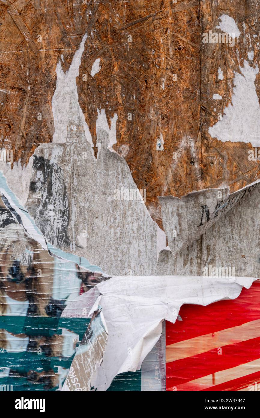 Ripped posters on the wall. Grunge background or blending modes of wall ...