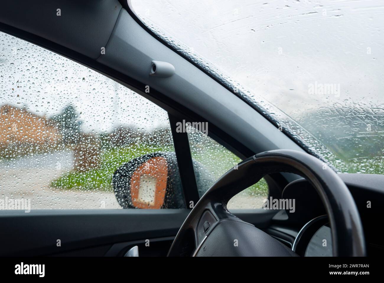 Rainy day from inside a car Stock Photo - Alamy