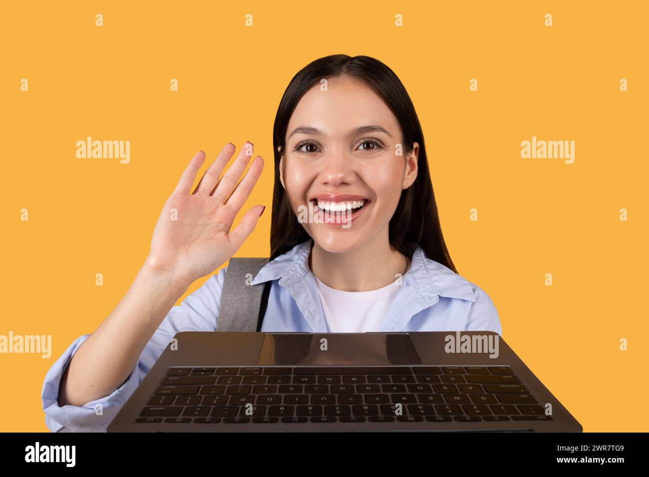 Online class greeting, female student with laptop waving hello Stock ...