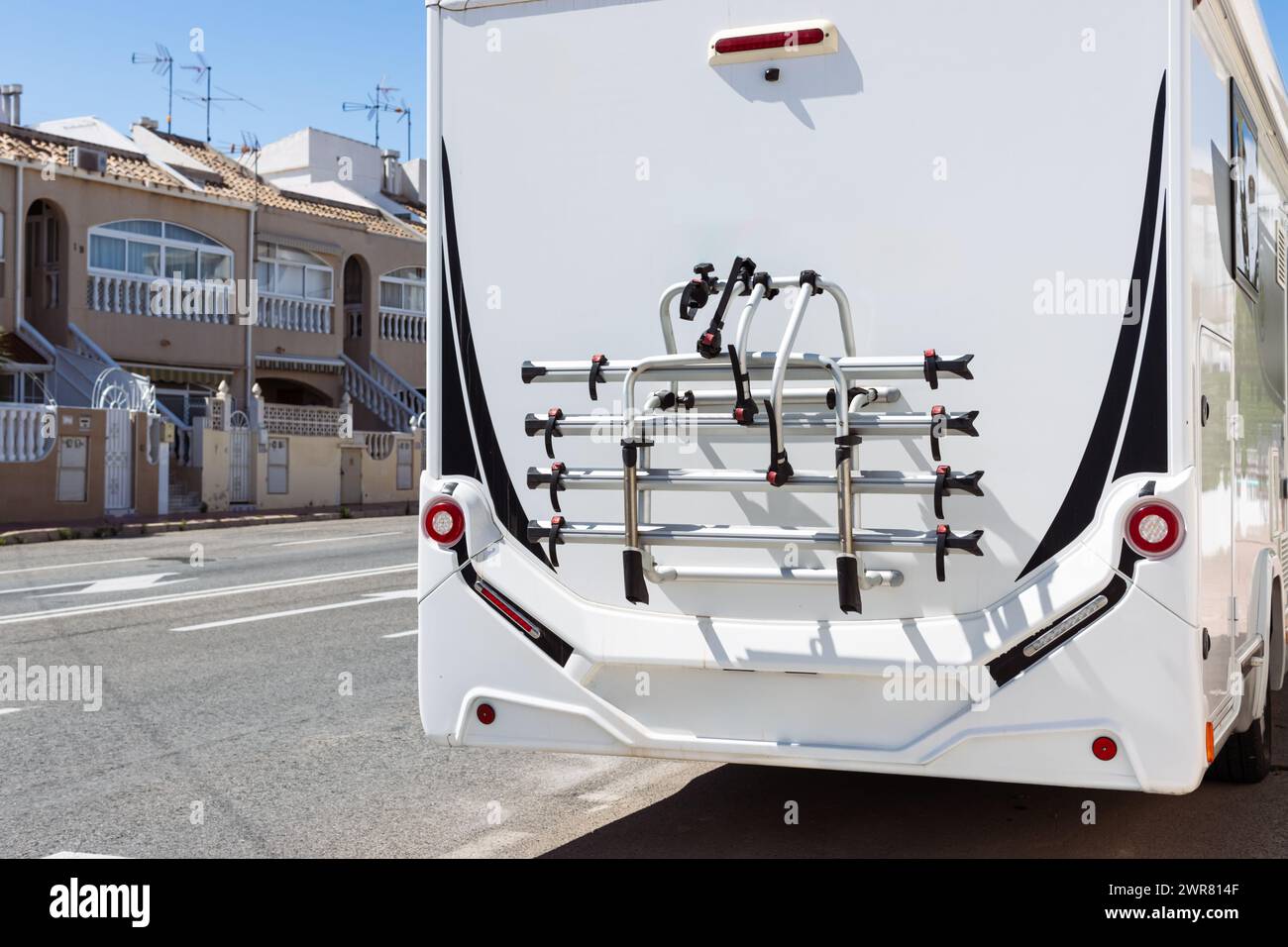 Rear view of a motorhome parked on the street, showing the vehicle and ...