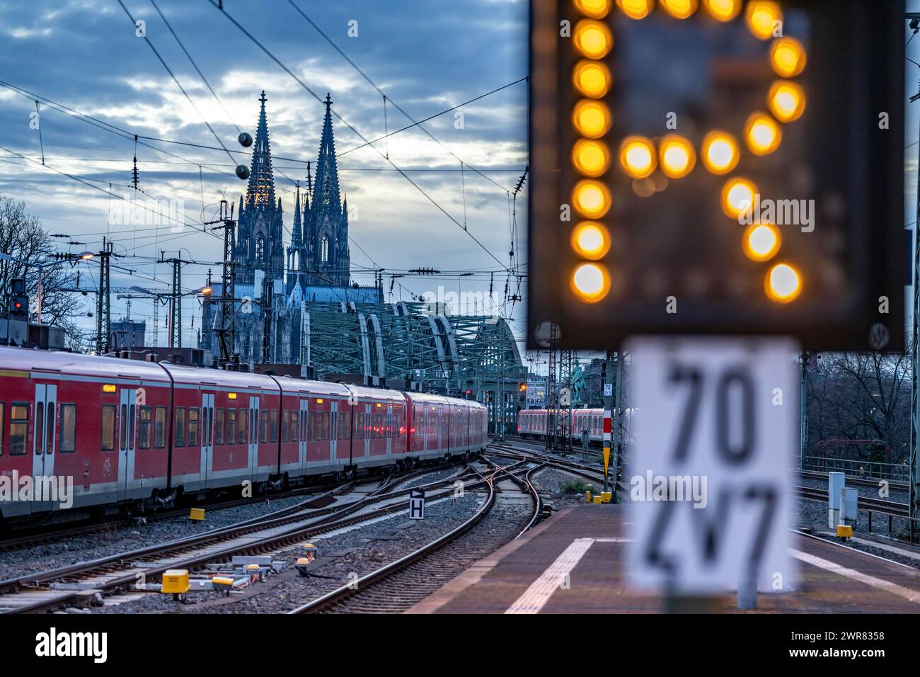 Local train on the line in front of Cologne Central Station ...