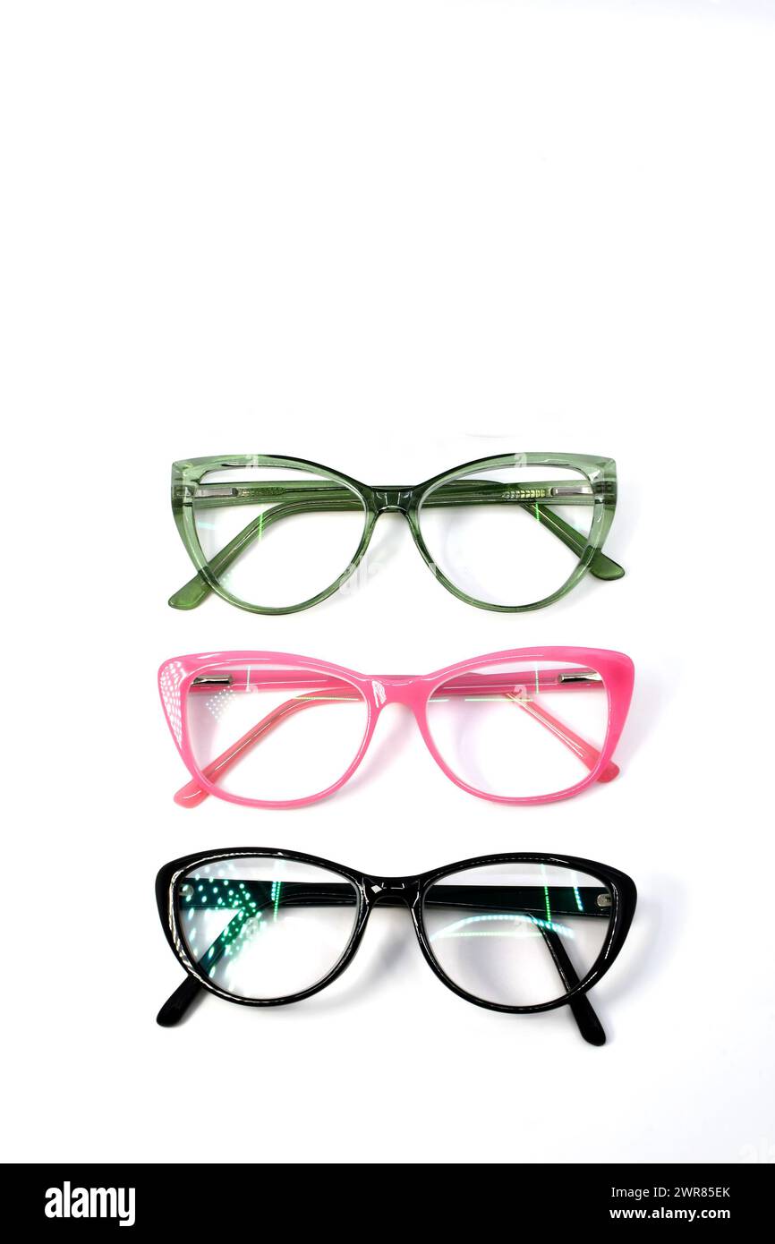 Pairs of stylish glasses in different colours and styles isolated on a ...