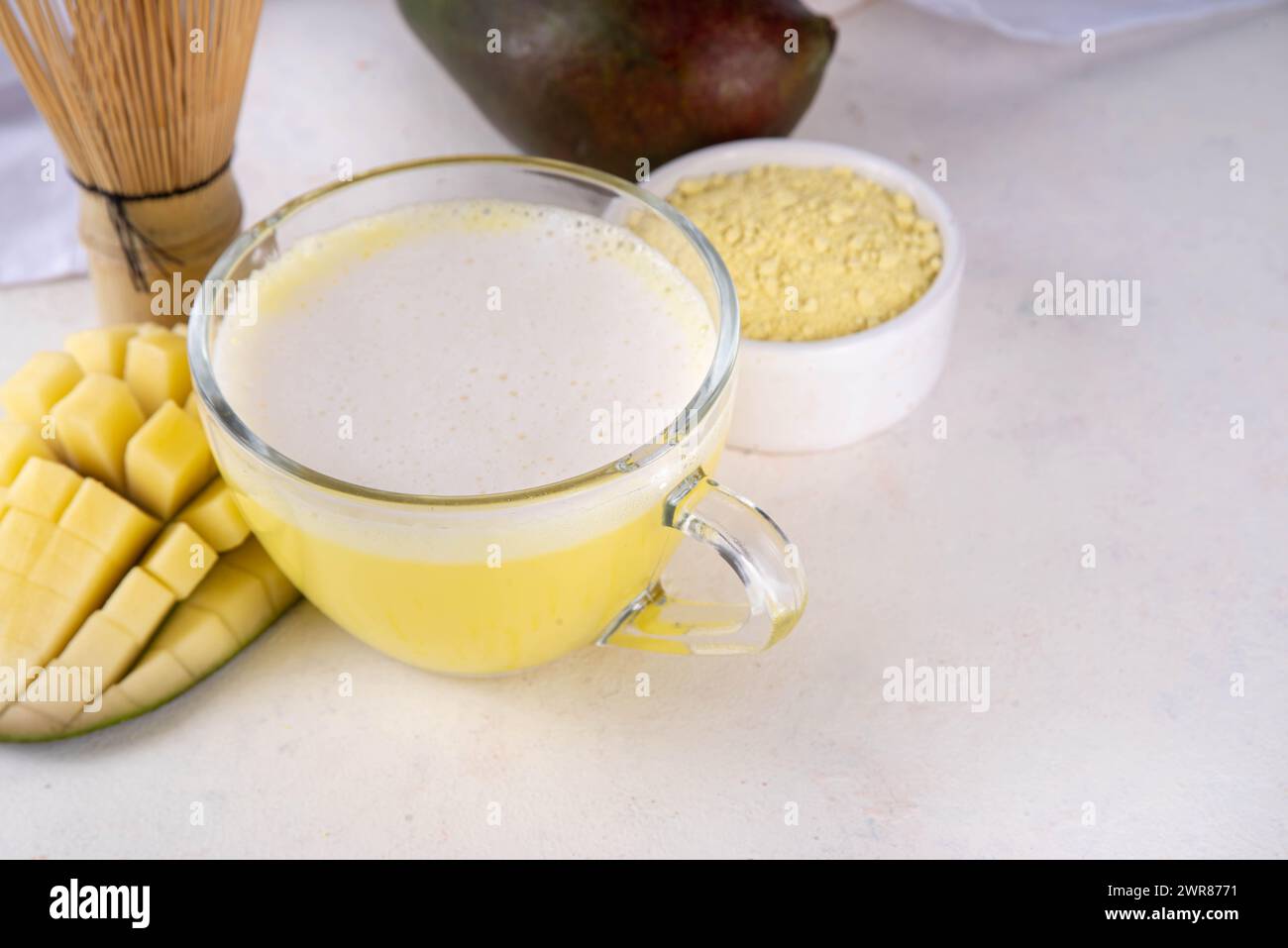 Yellow matcha drink. Mango matcha extract tea or latte, fruity healthy ...