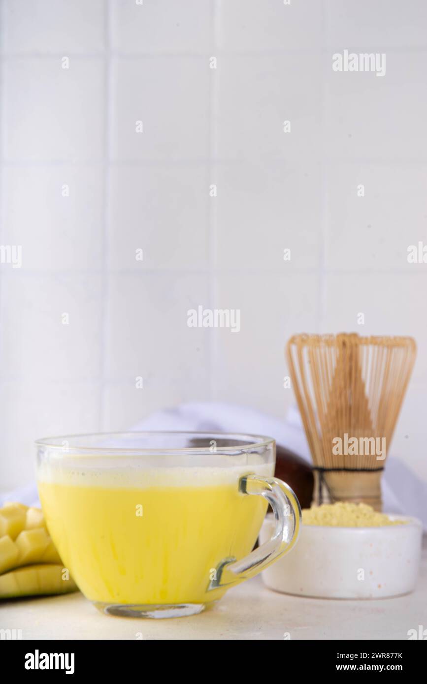 Yellow matcha drink. Mango matcha extract tea or latte, fruity healthy ...