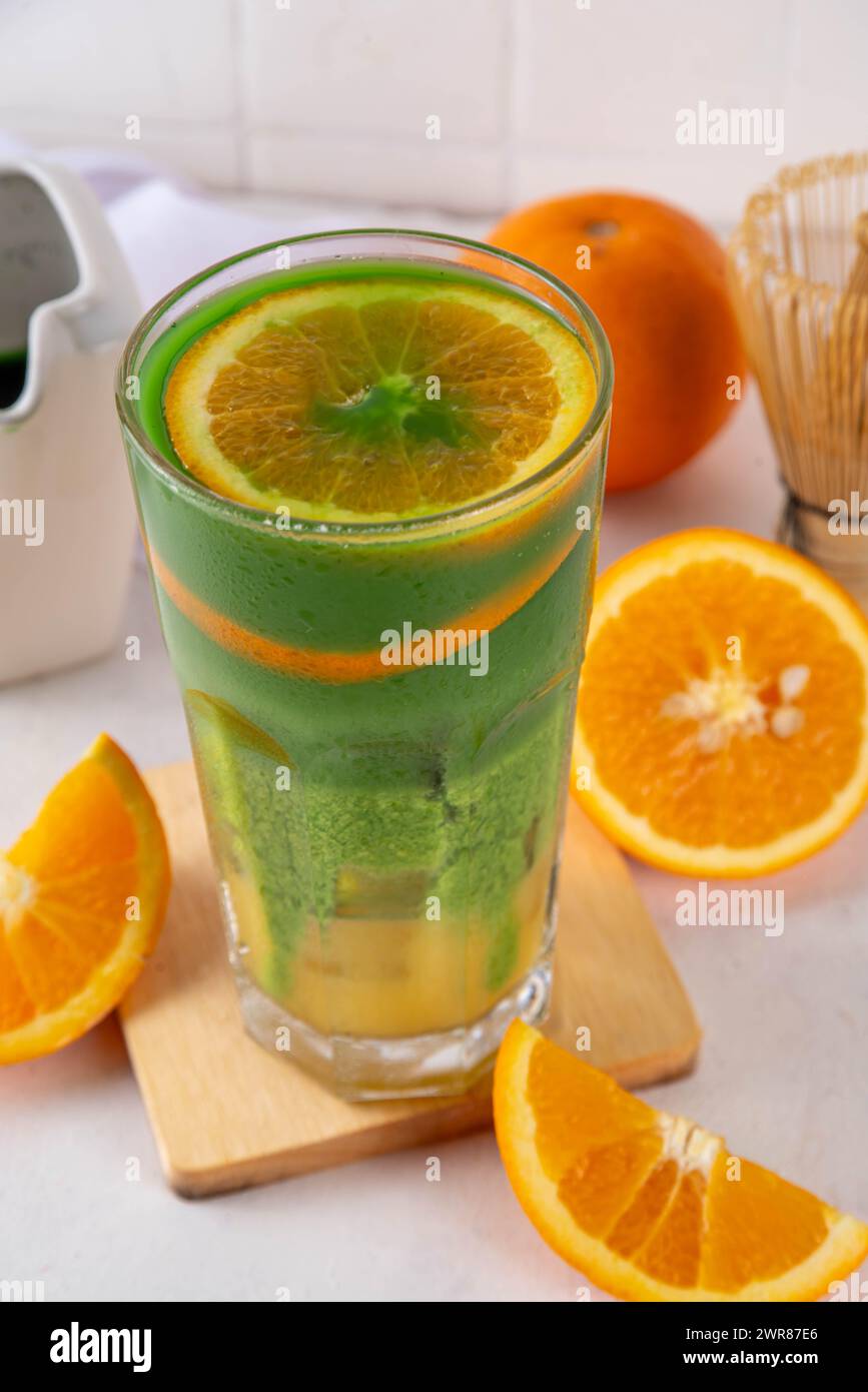 Orange Matcha Lemonade, Cold asia fruit cocktail with green matcha and ...