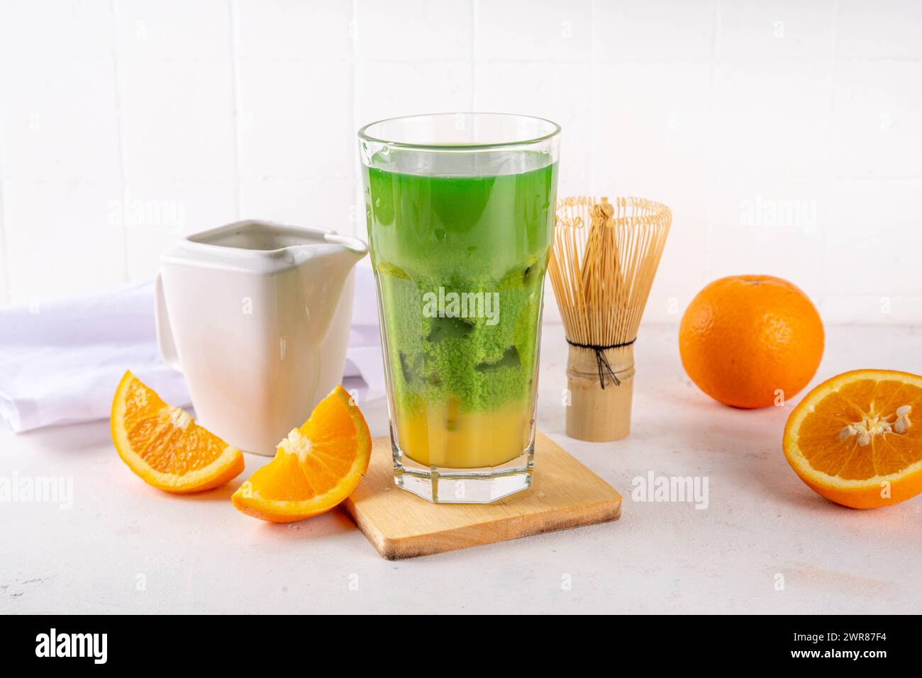 Orange Matcha Lemonade, Cold asia fruit cocktail with green matcha and ...