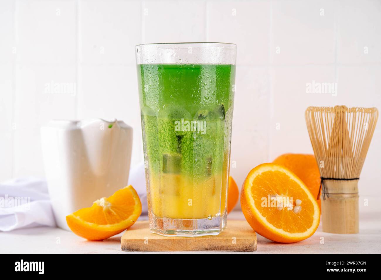 Orange Matcha Lemonade, Cold asia fruit cocktail with green matcha and ...