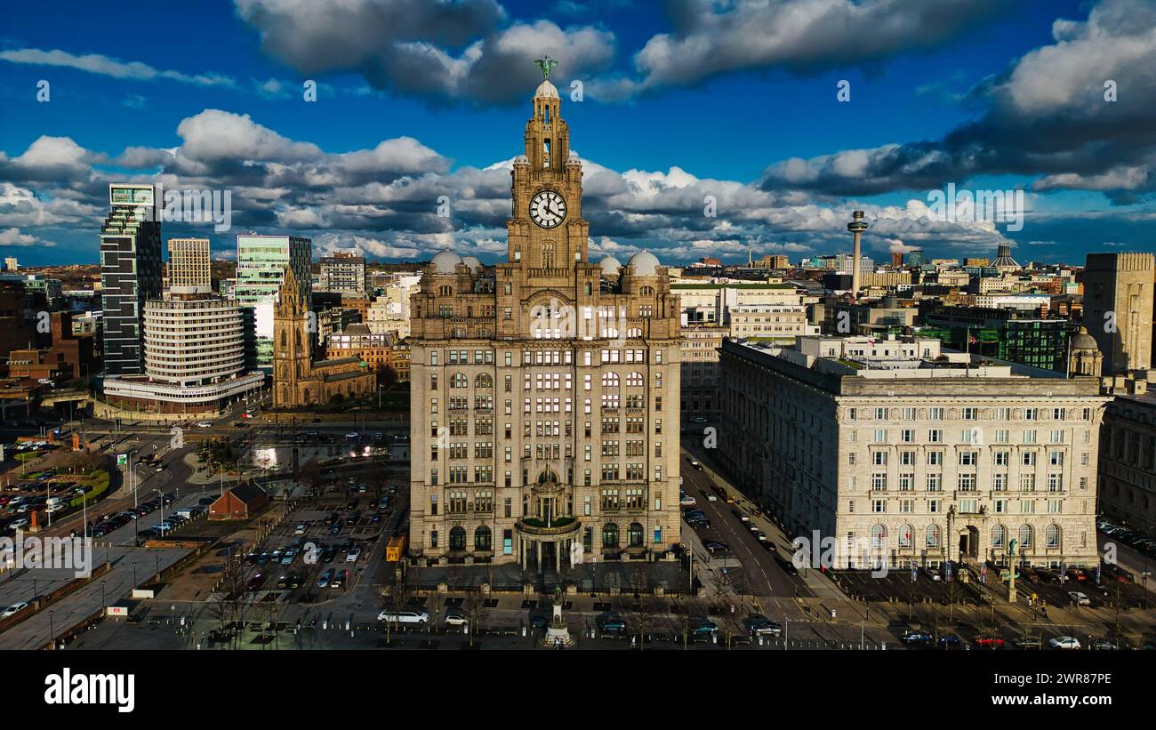 Aerial view of a cityscape with historic buildings under a cloudy sky ...