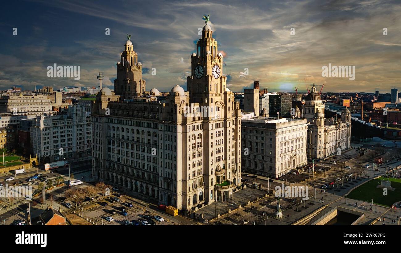 Dramatic skyline of Liverpool with iconic Liver Building at sunset ...