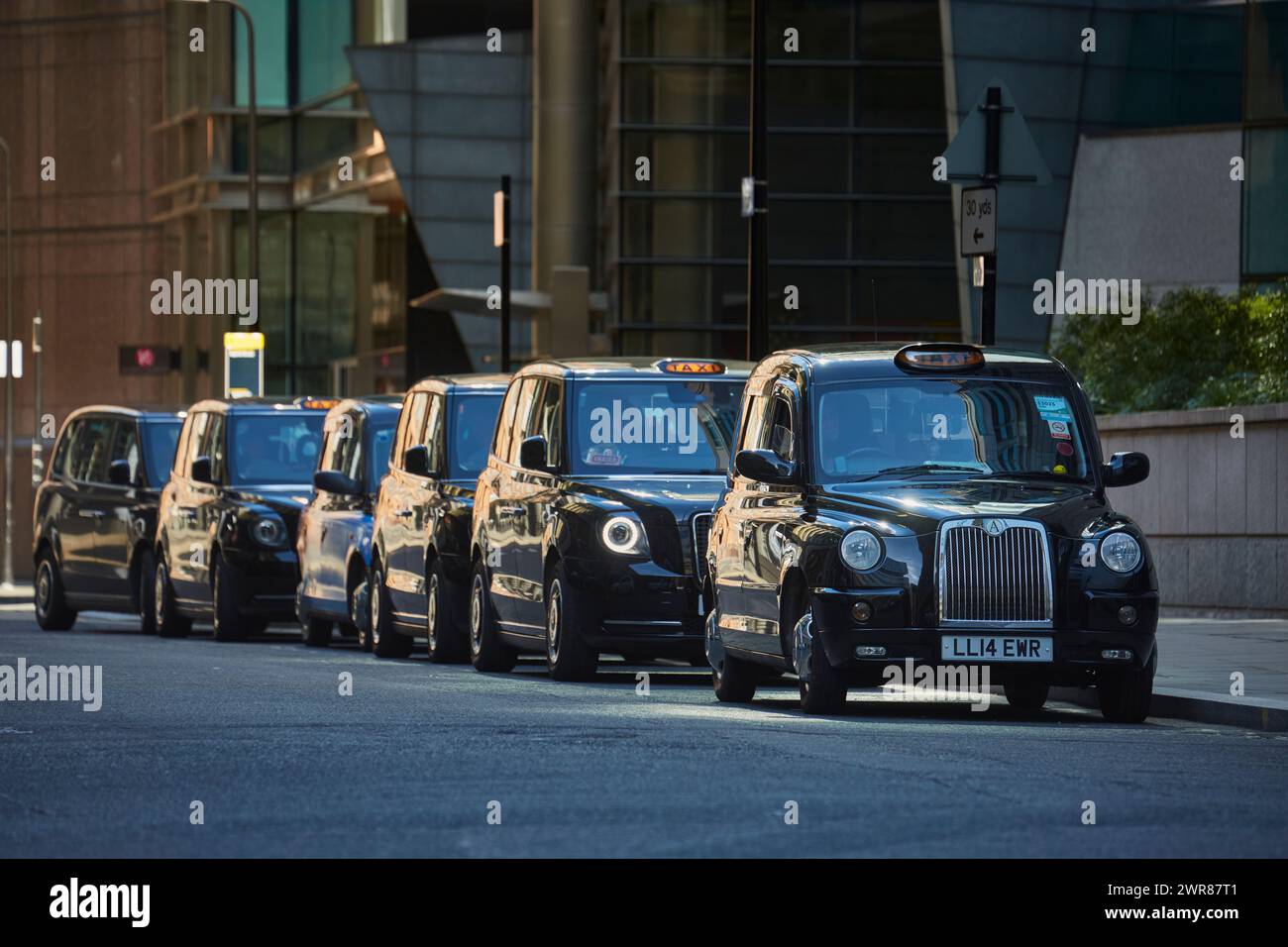 Six London Taxis know as a black cabs in the Paddington area London ...