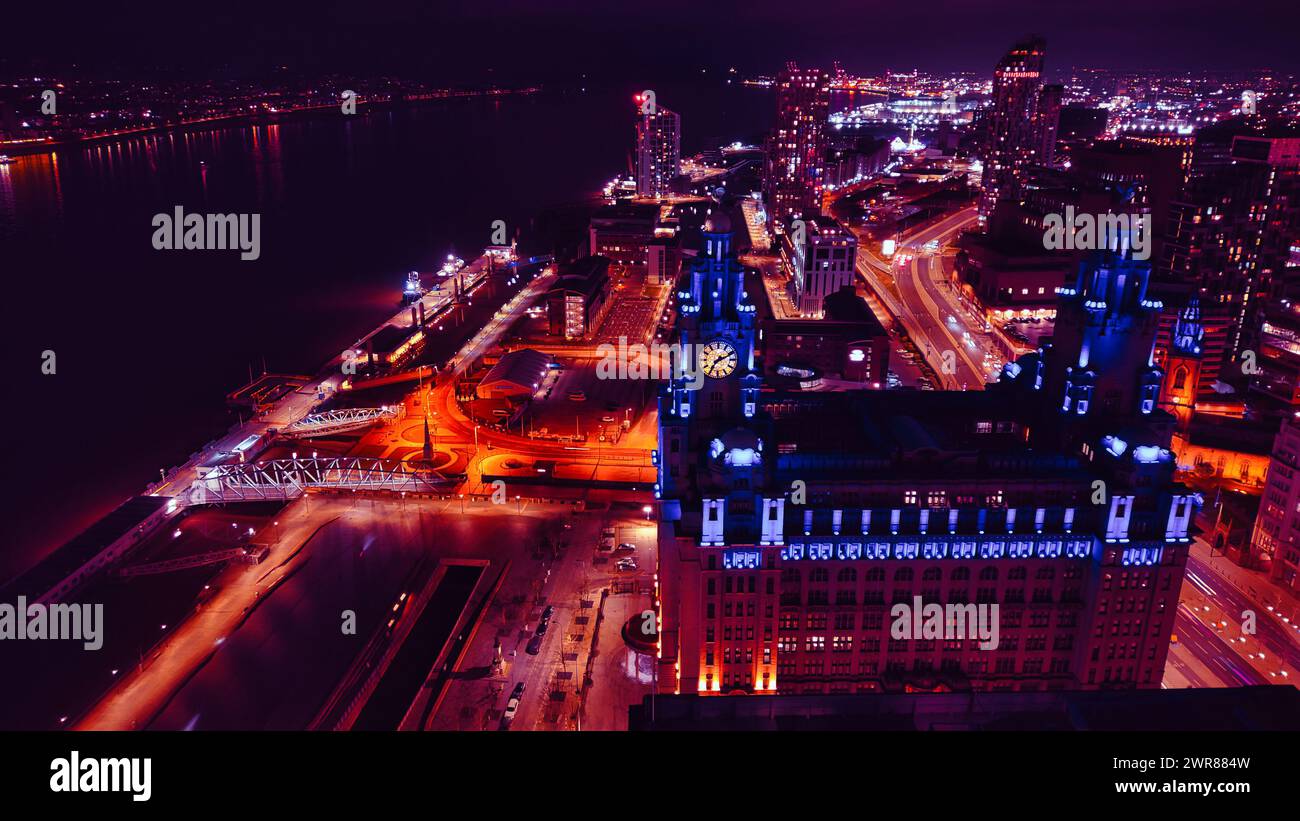 Aerial night view of a vibrant cityscape with illuminated streets and ...