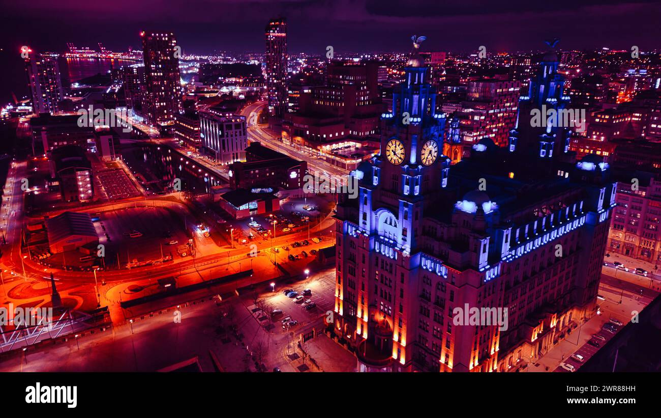 Aerial night view of a vibrant cityscape with illuminated streets and ...